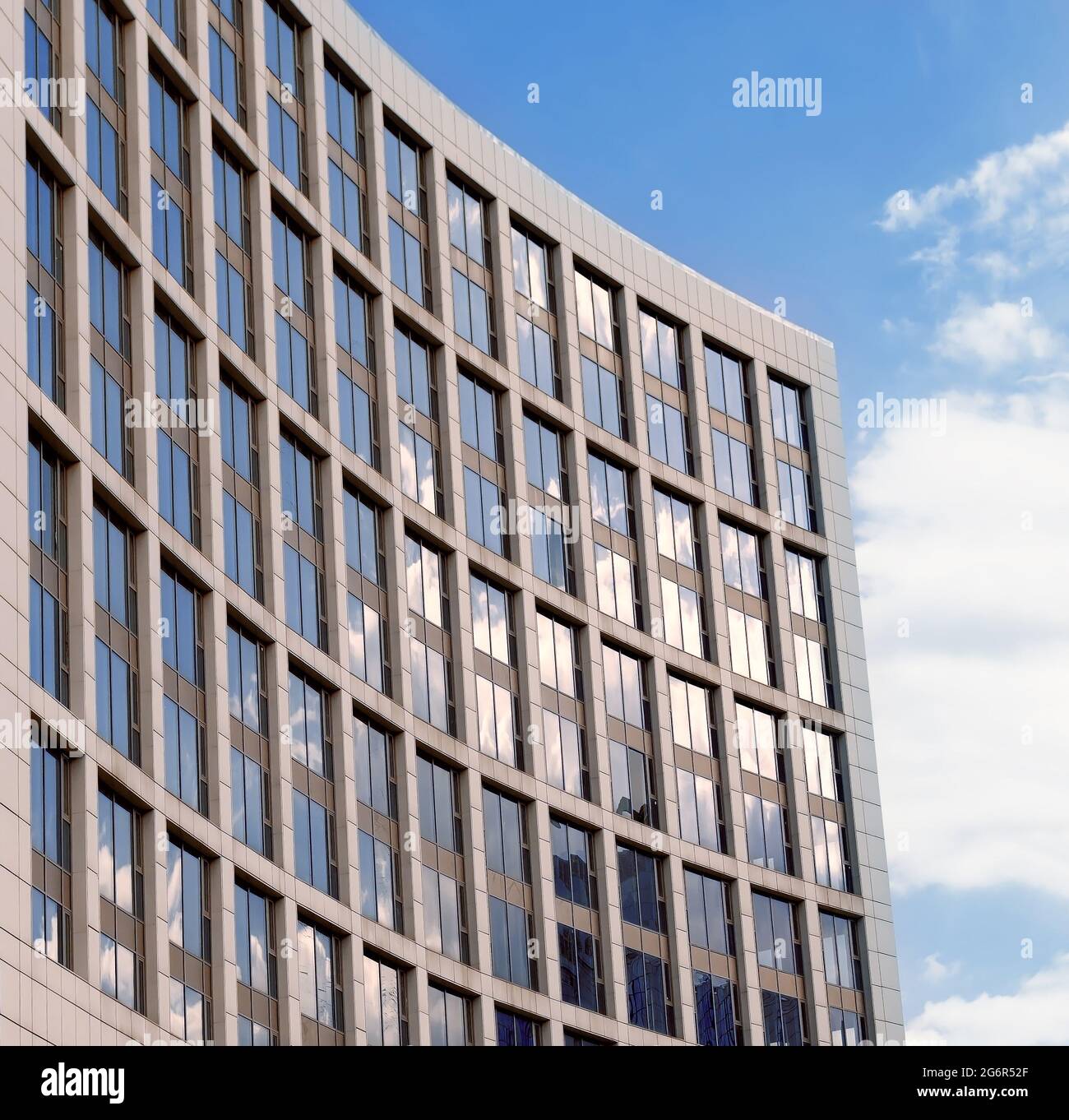 multi-storey modern building with a glass facade, modern architecture ...