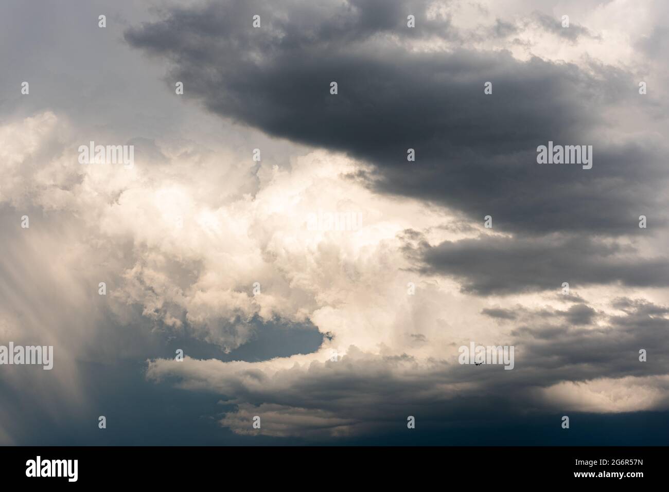 huge storm cloud, tower cumulus and cumulonimbus cloud Stock Photo - Alamy