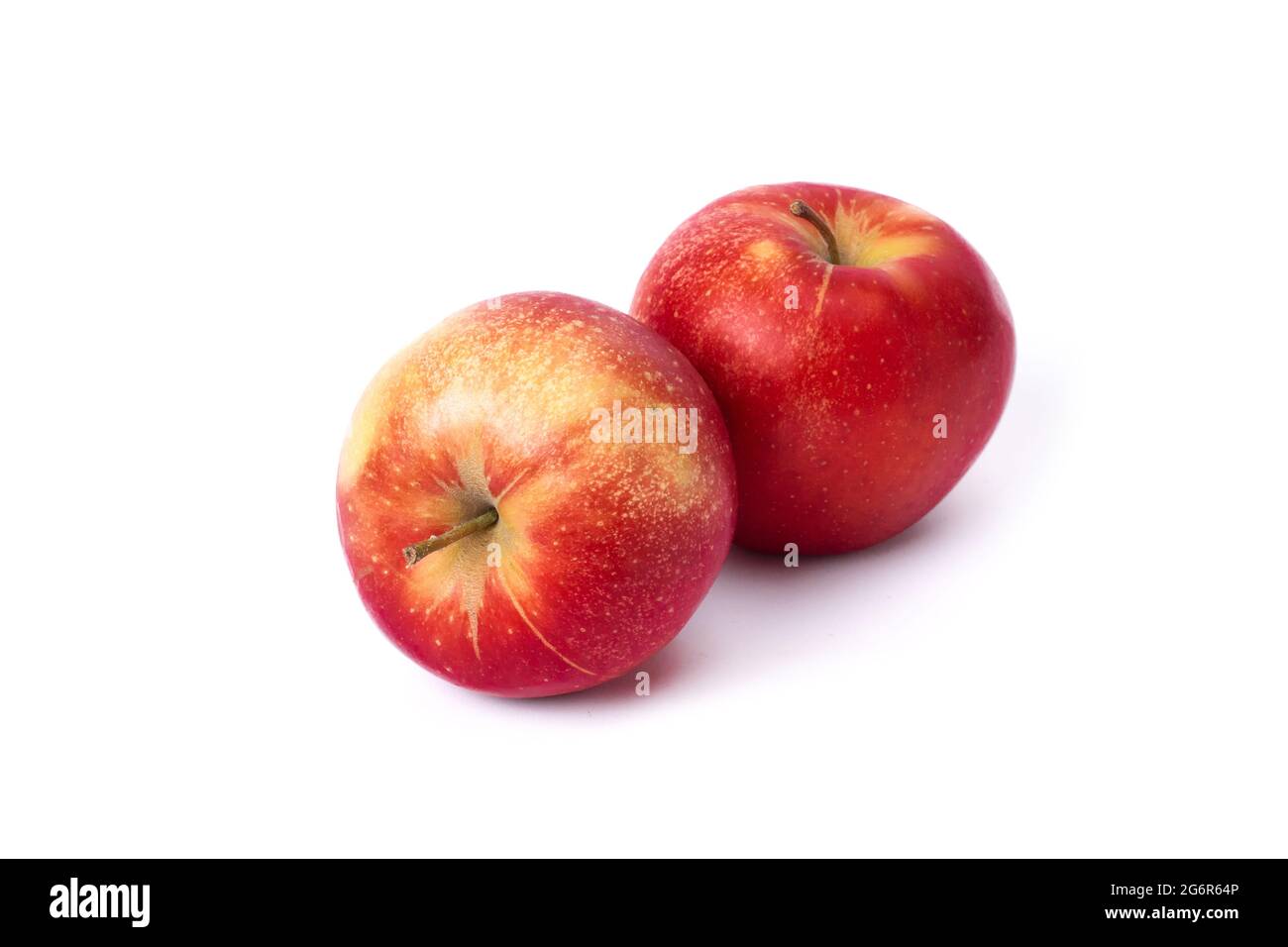 Two red apples on a white background. Juicy apples of red color with ...