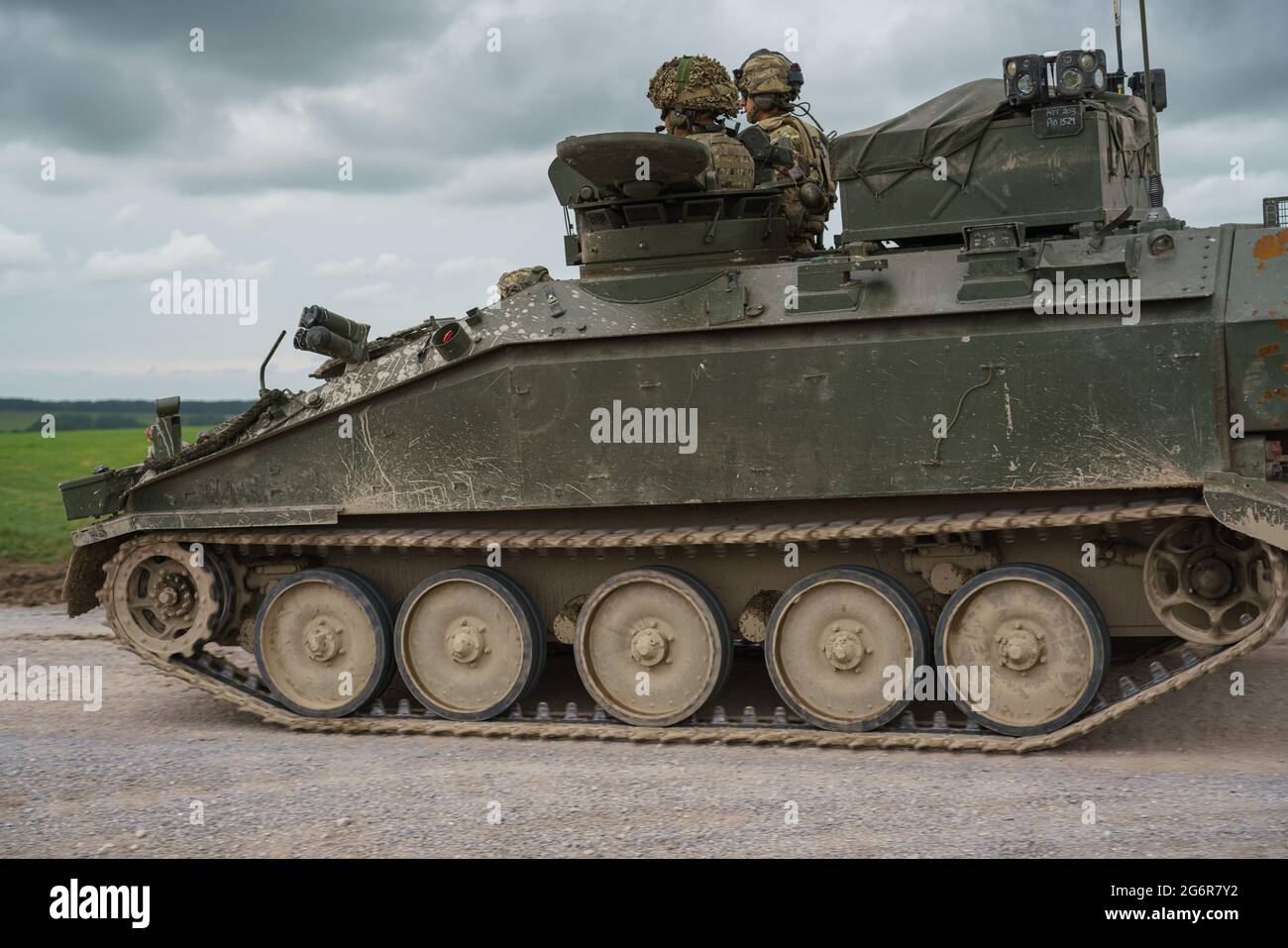 british army FV103 Spartan light armored vehicle in action on a ...