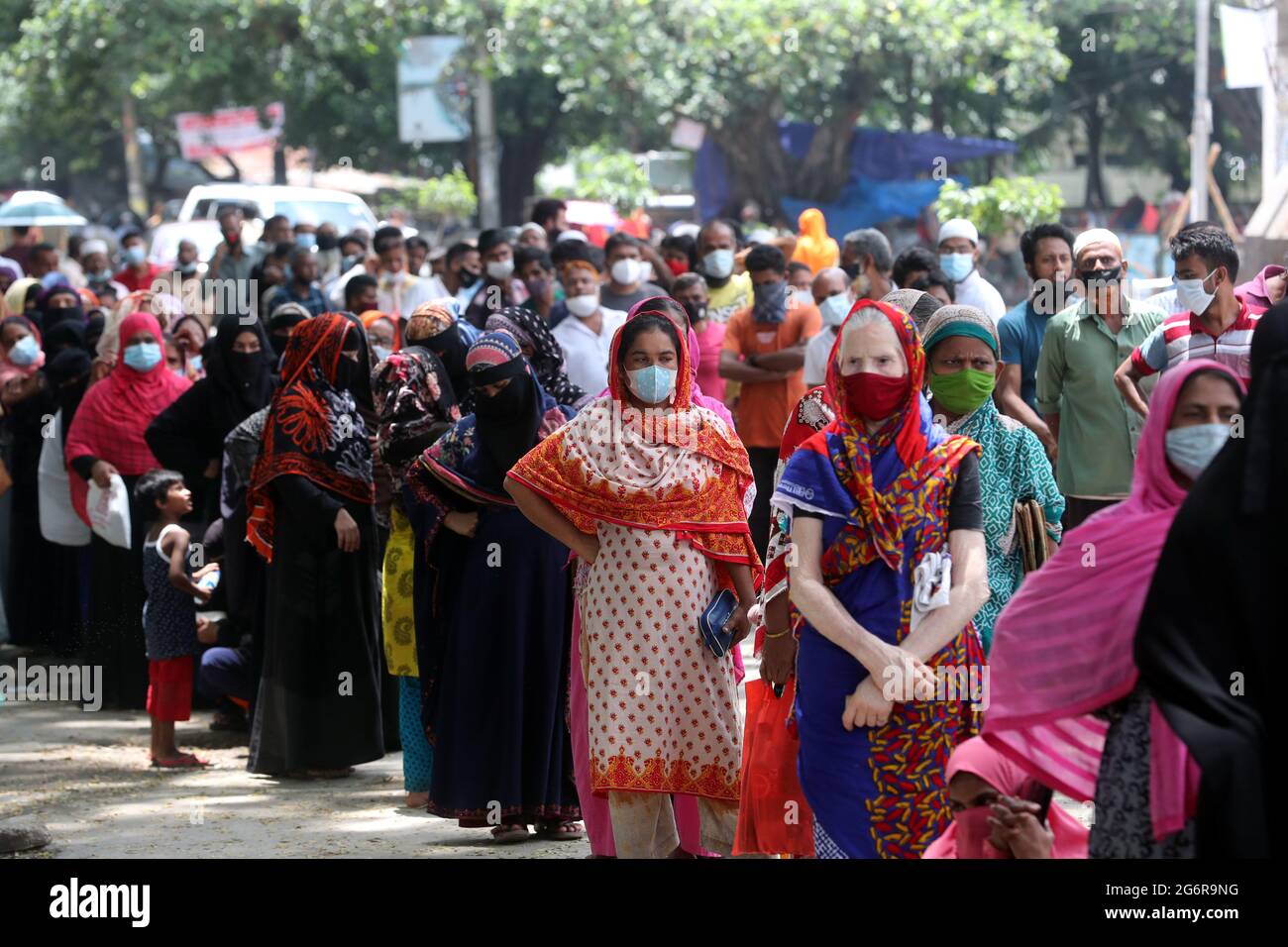 July 9, 2021: Dhaka,Bangladesh: Thousands of people are standing in ...