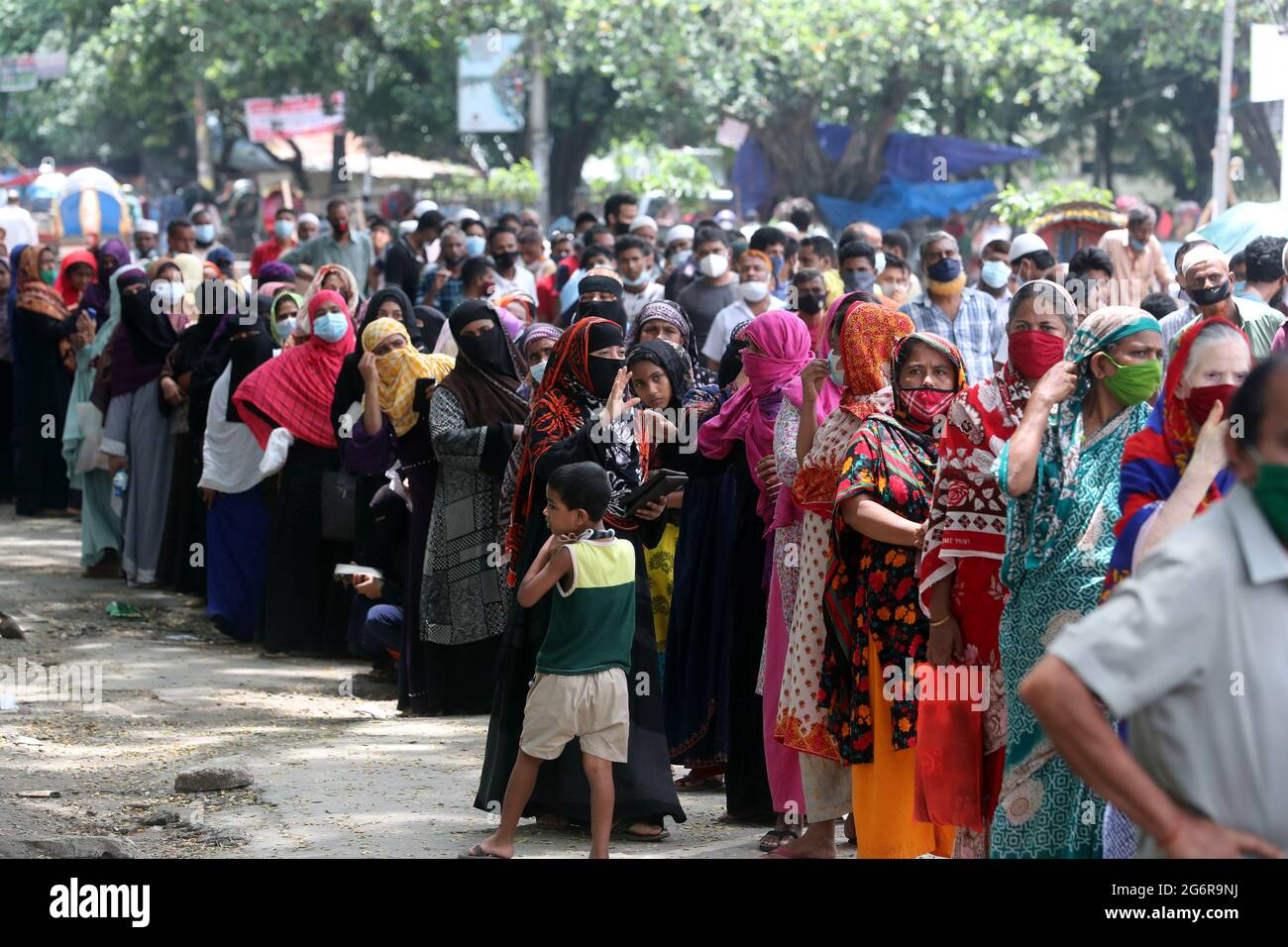 July 9, 2021: Dhaka,Bangladesh: Thousands of people are standing in ...
