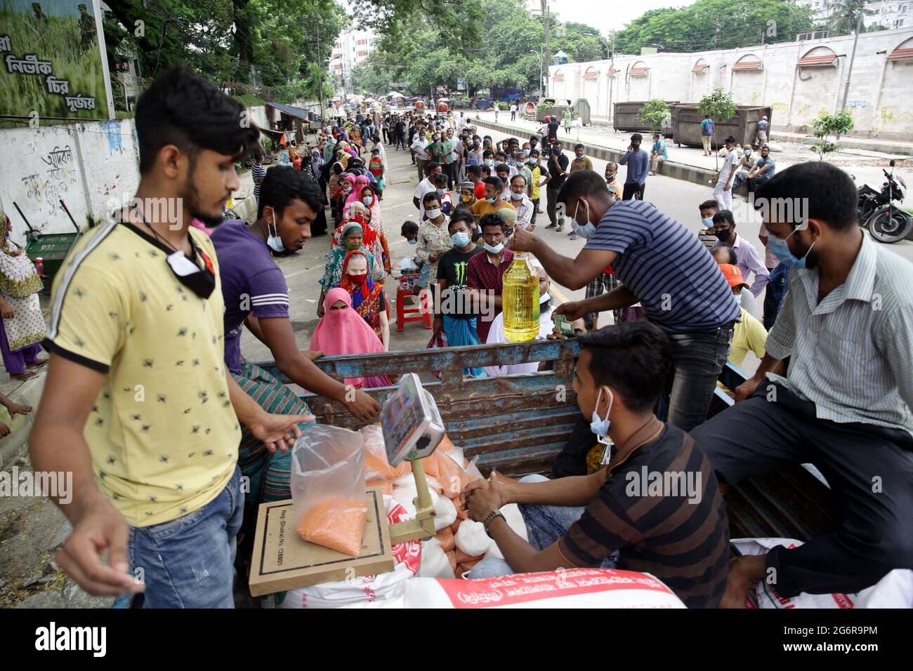 July 9, 2021: Dhaka,Bangladesh: Thousands of people are standing in ...
