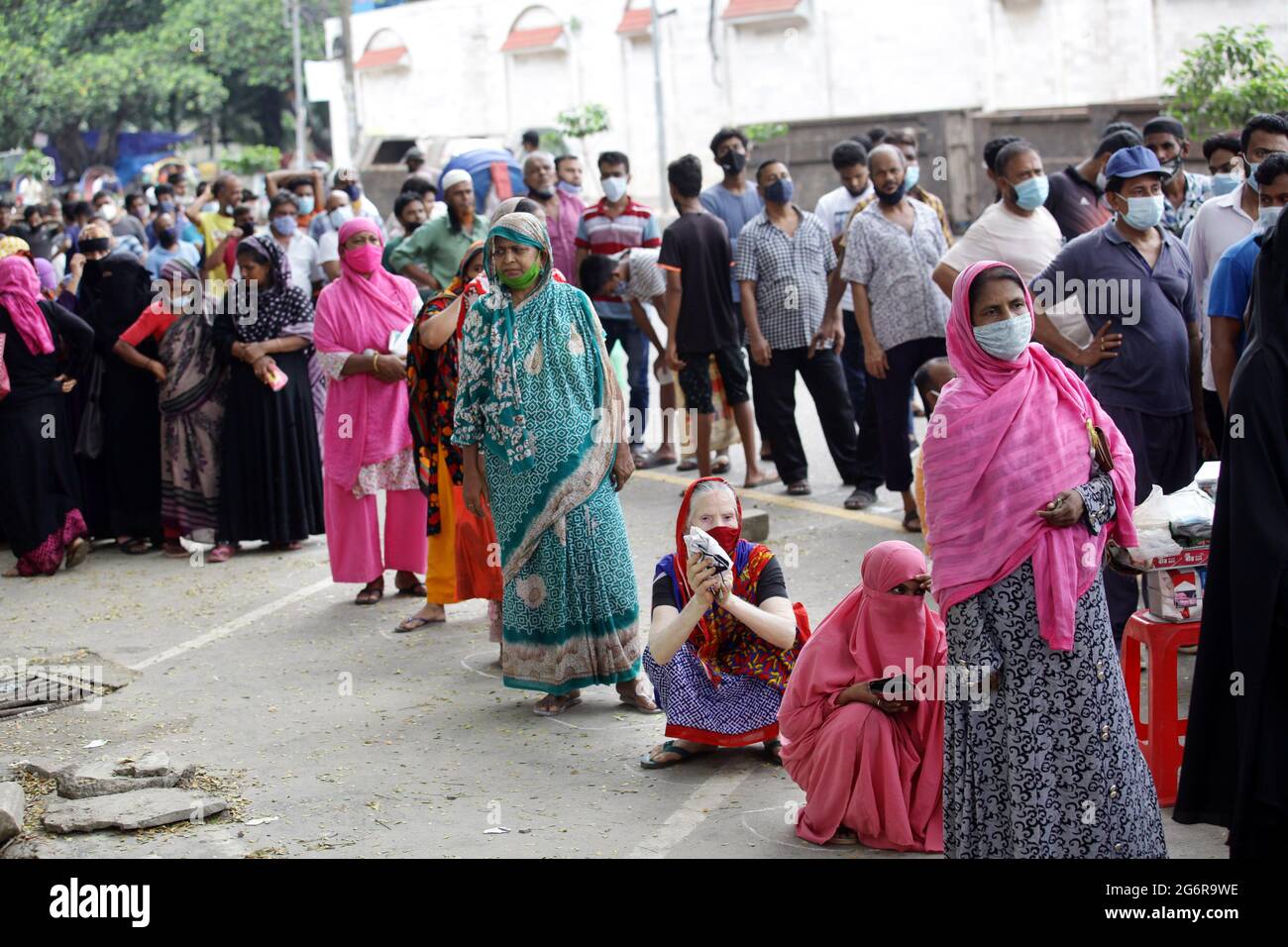 July 9, 2021: Dhaka,Bangladesh: Thousands of people are standing in ...