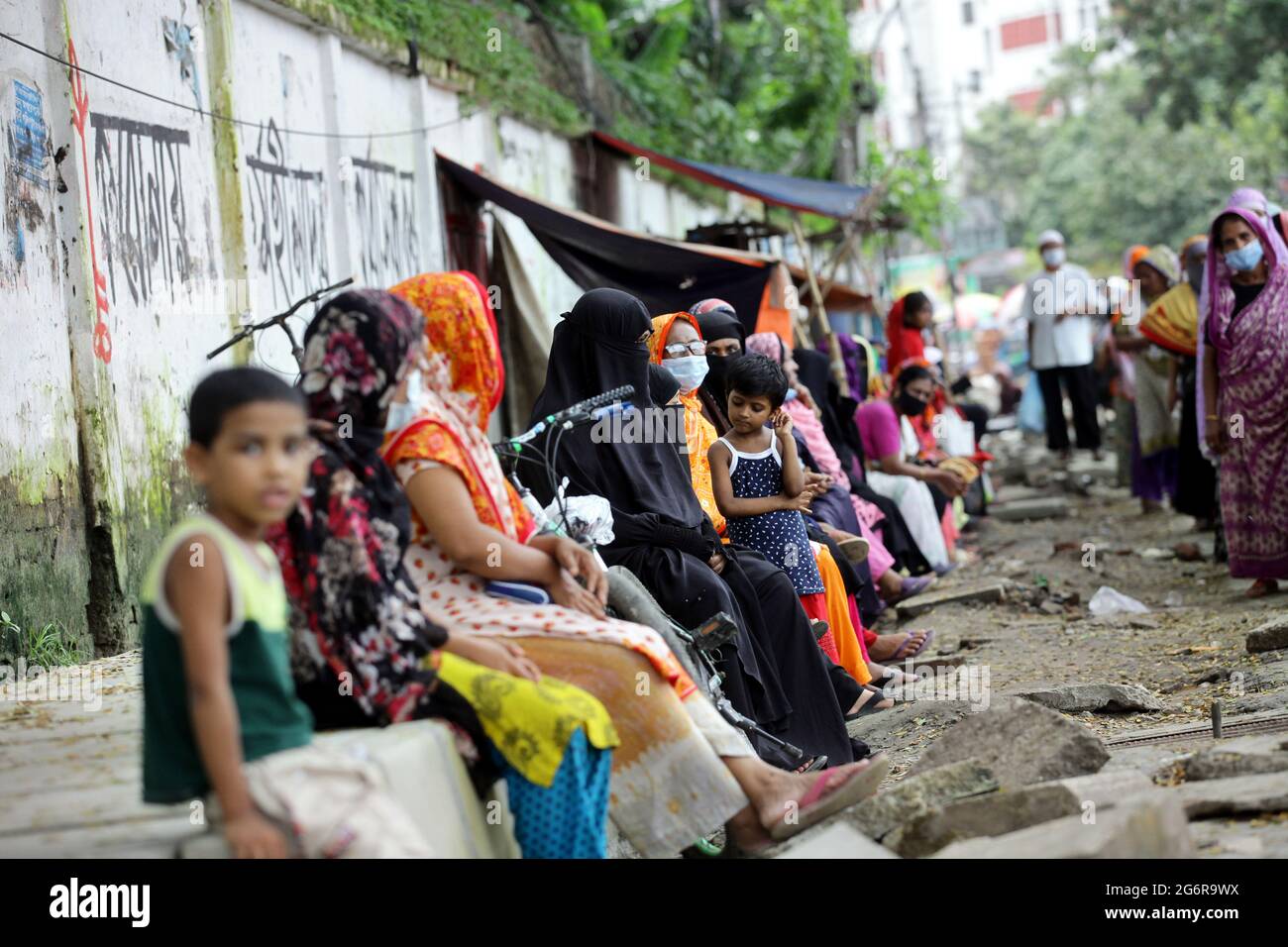 July 9, 2021: Dhaka,Bangladesh: Thousands of people are standing in ...