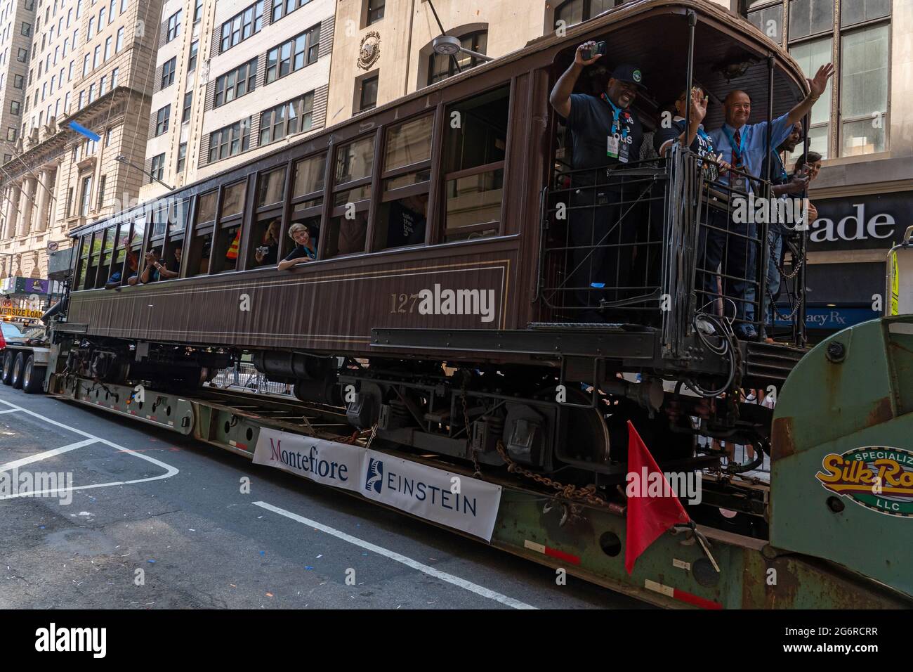 MTA workers ride a 118-year-old subway car during the "Hometown Heroes ...