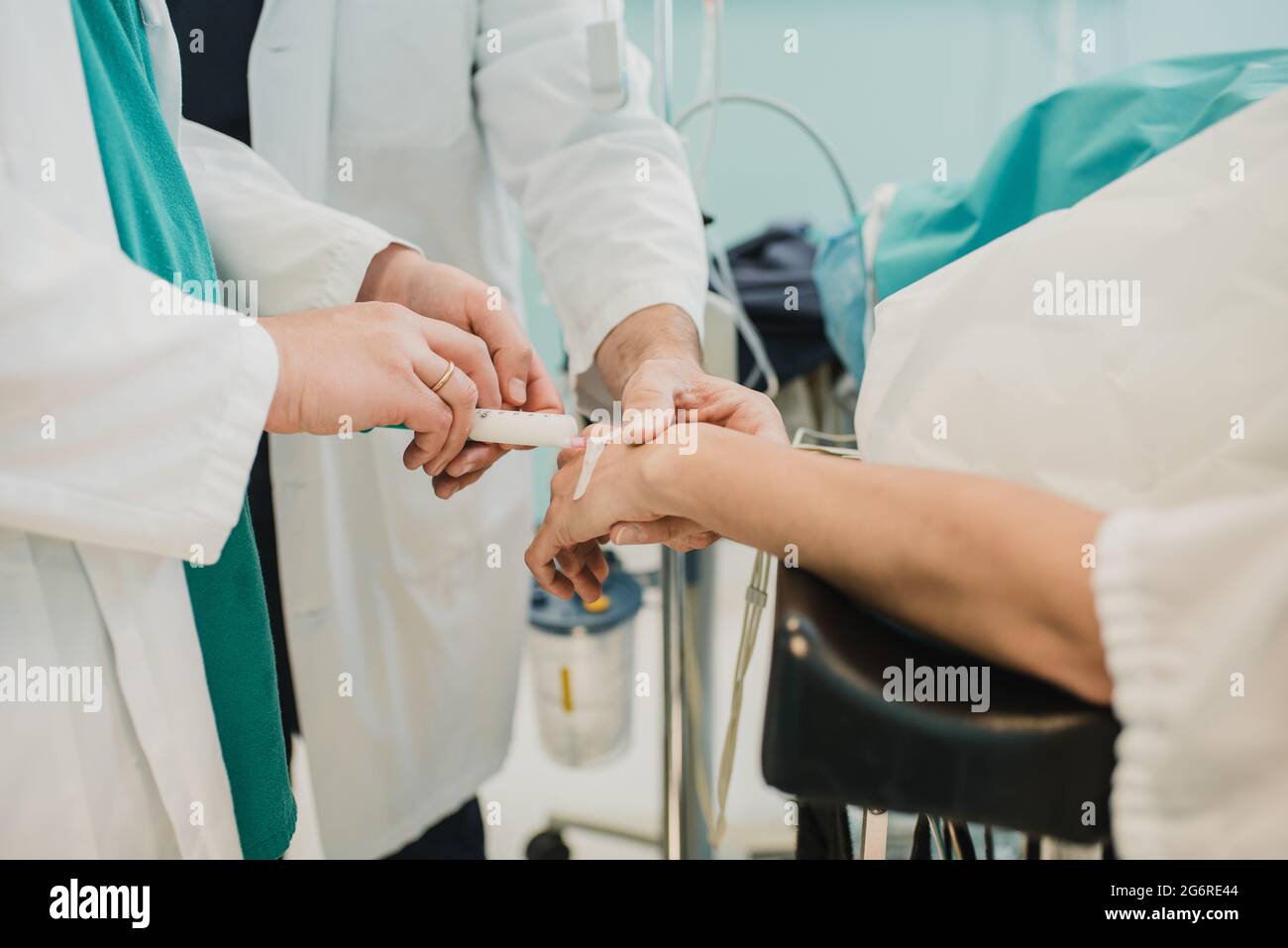 Medical doctor giving patient anesthesia before surgical operation ...