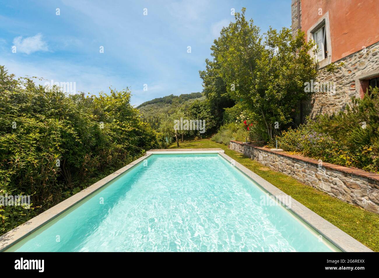 Exterior of Italian villa in Tuscany with swimming pool. Day of great ...