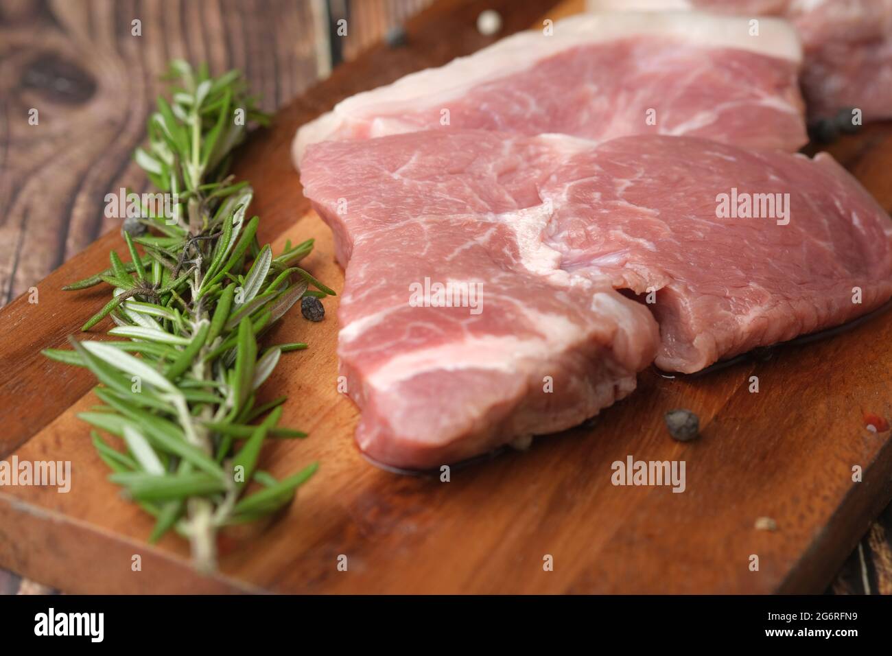 close up of raw meat on chopping board on a chopping board Stock Photo ...