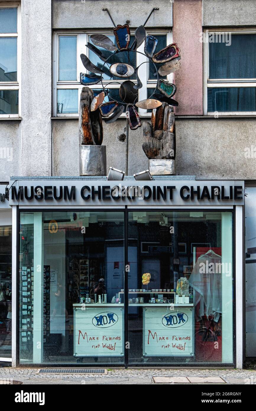 Checkpoint Charlie Museum exterior with Make Friends not Walls sign ...