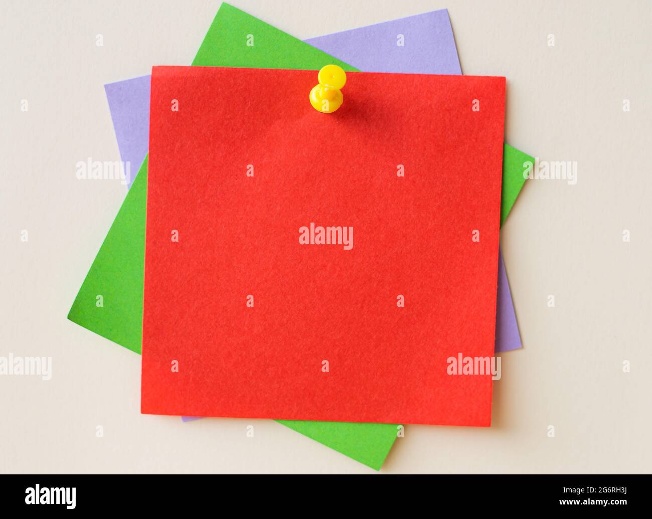 Colorful Paper Notes Stacked Together And Pinned On The Wall. Different ...