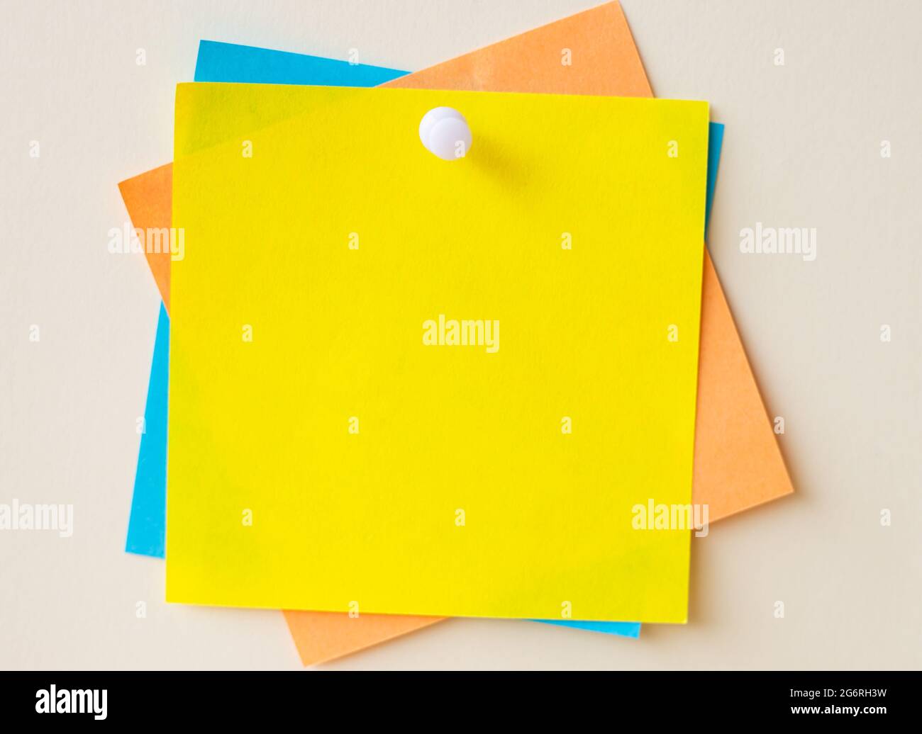 Colorful Paper Notes Stacked Together And Pinned On The Wall. Different ...