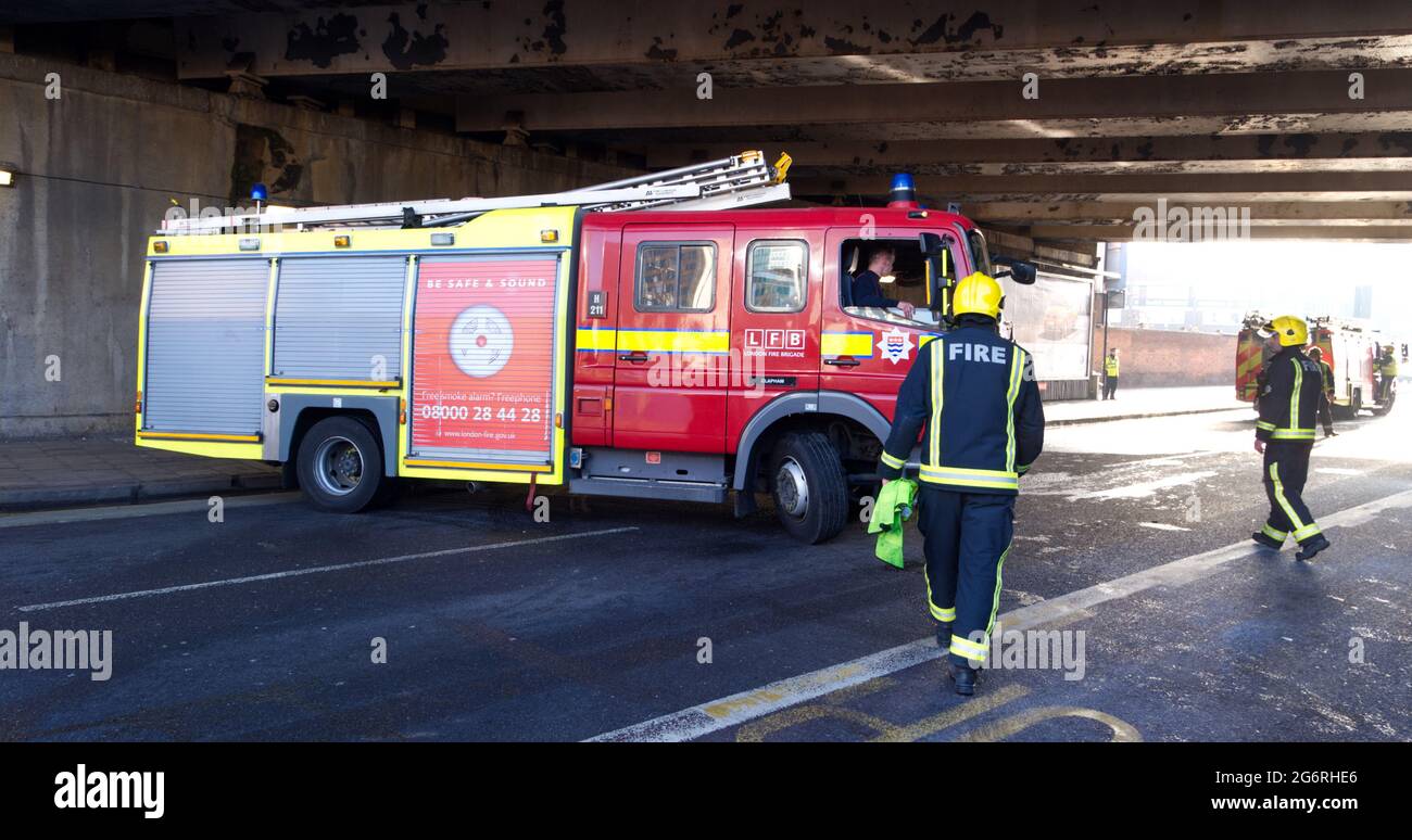 London Fire Brigade Fire Engine with Firefighters Stock Photo - Alamy