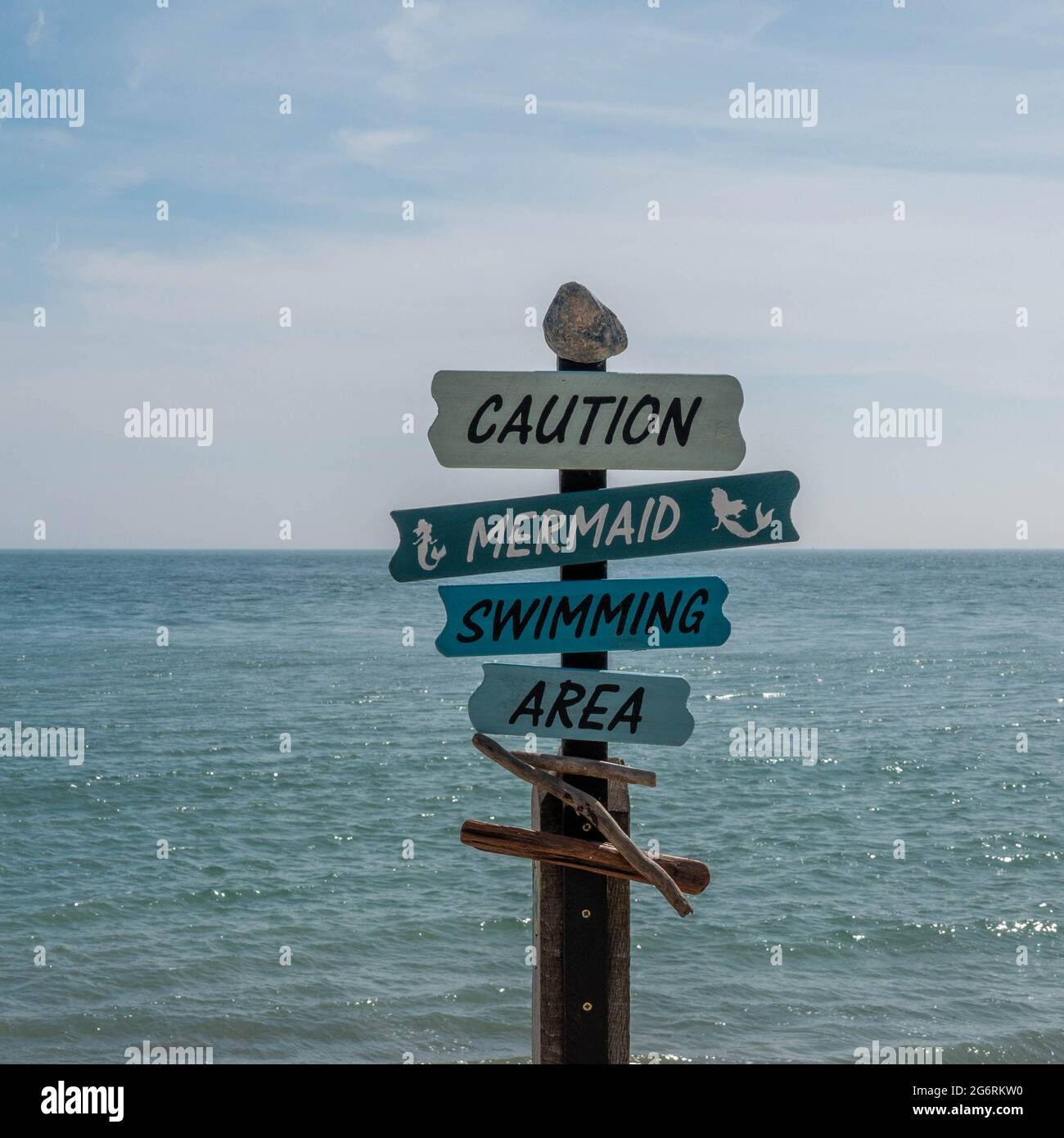 fun warning sign by the sea caution mermaid swimming area Stock Photo ...
