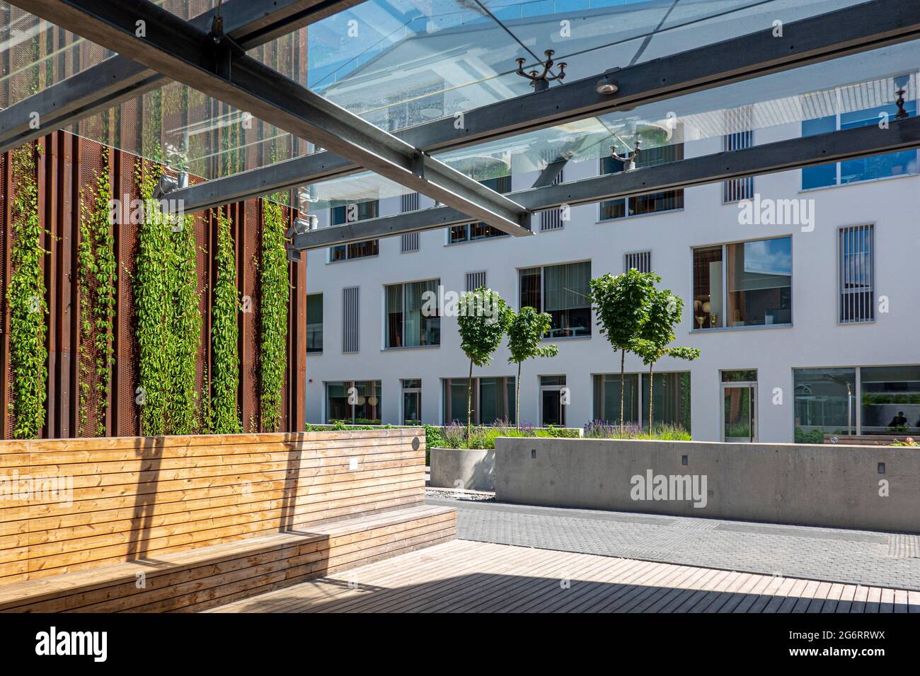 New office building and outdoors recreation area with modern city ...