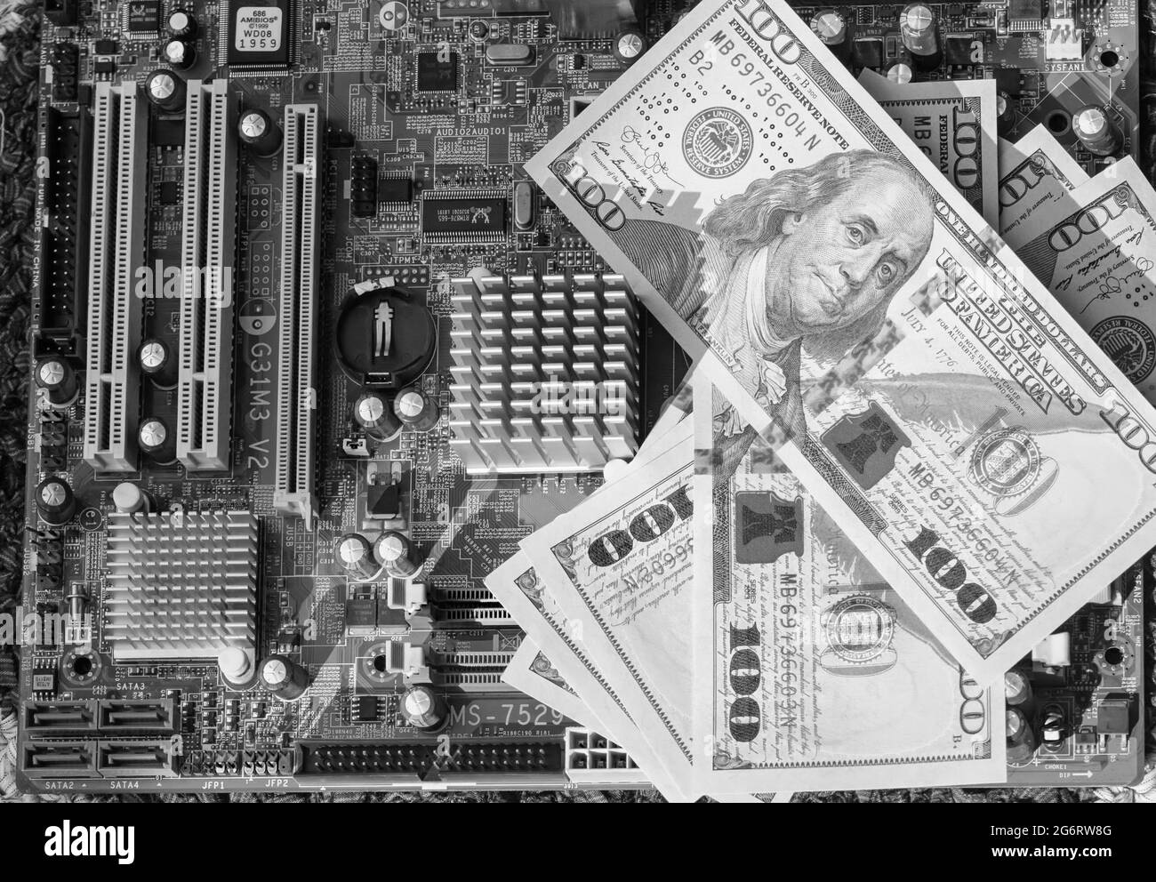 Real interesting computer motherboard and dollar bills for real moment ...