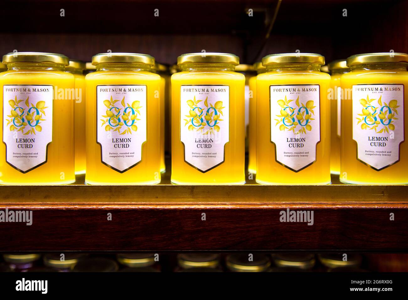 Row of lemon curd jars at Fortnum & Mason department store, London, UK ...