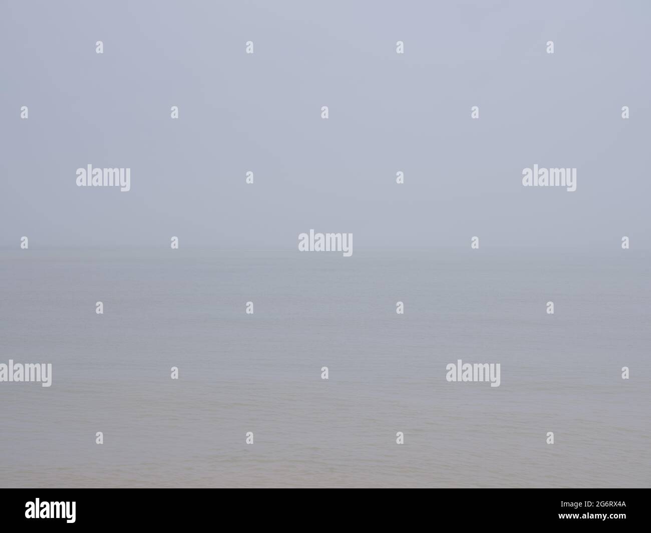 An empty grey seascape and cloudy horizon line - grey empty seascape ...