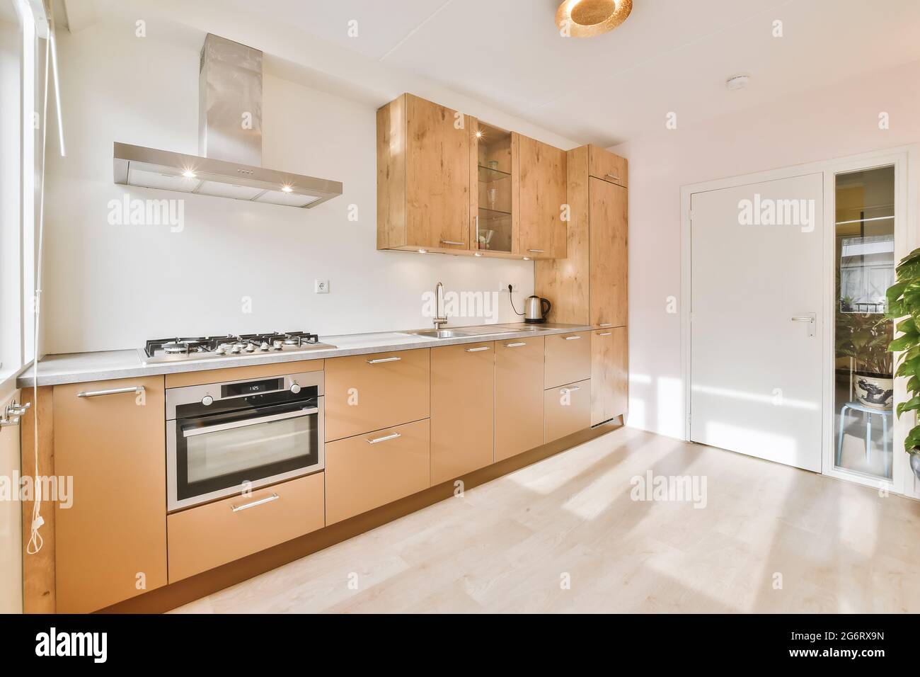 Beautiful and spacious kitchen in an elegant home Stock Photo - Alamy