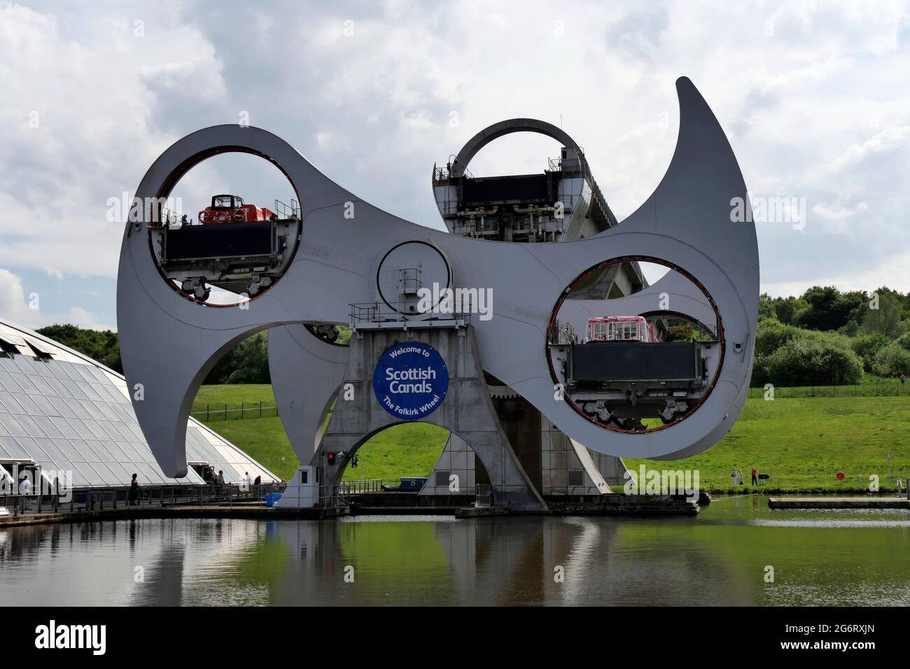 the Falkirk Wheel , rotating boat lift connects the Forth and Clyde ...
