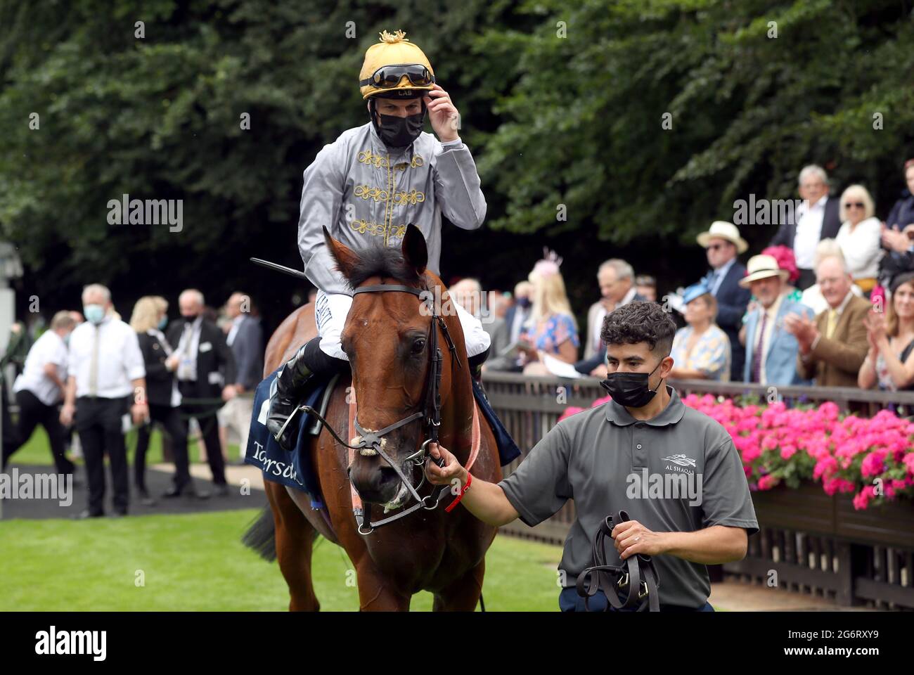 Lusail and jockey Pat Dobbs after winning the Tattersalls July Stakes ...