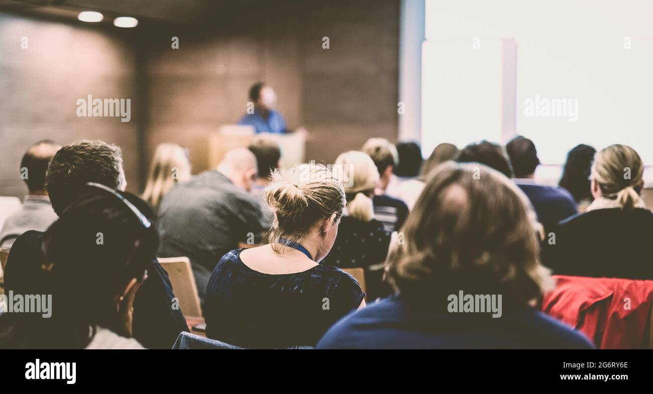 Speaker giving presentation on health care conference Stock Photo - Alamy