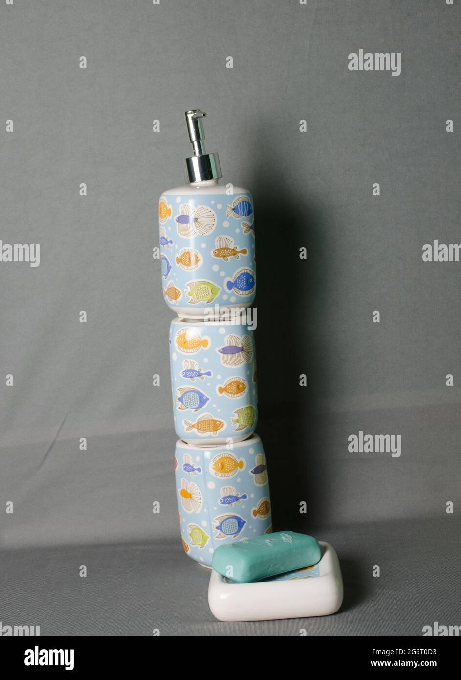 A vertical still life with soap containers Stock Photo - Alamy