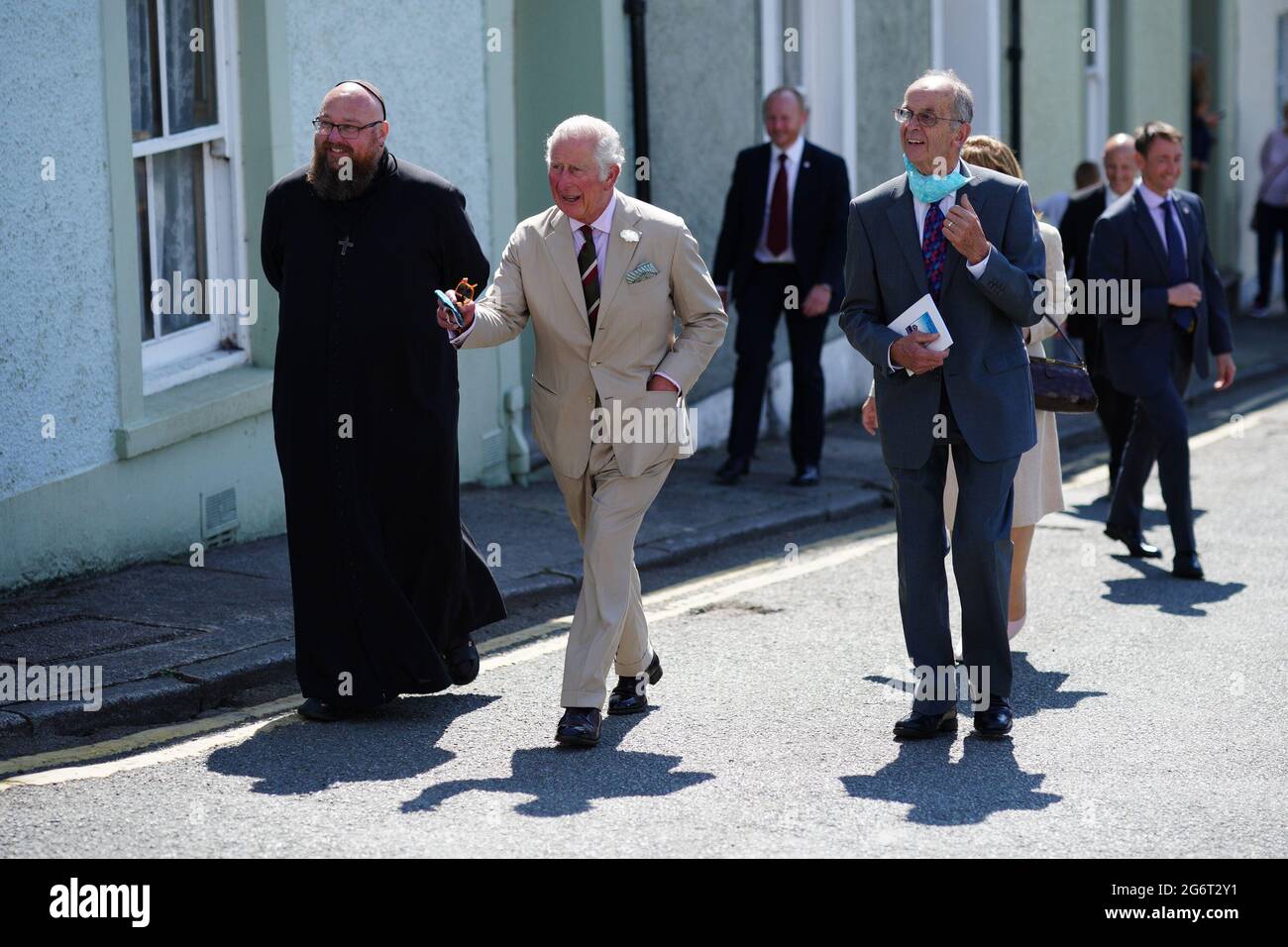 (left to right) Father Neil Hook, the Prince of Wales and retired ...