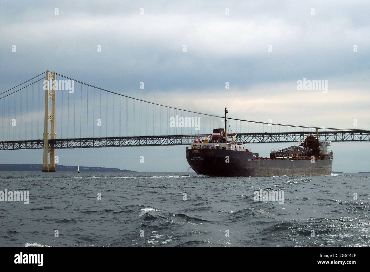 Large freighter passing through Straits of Mackinac, pass between Great ...