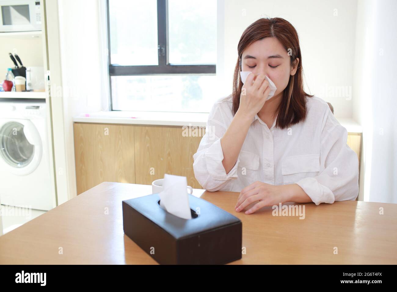 Woman feel sick at home Stock Photo - Alamy
