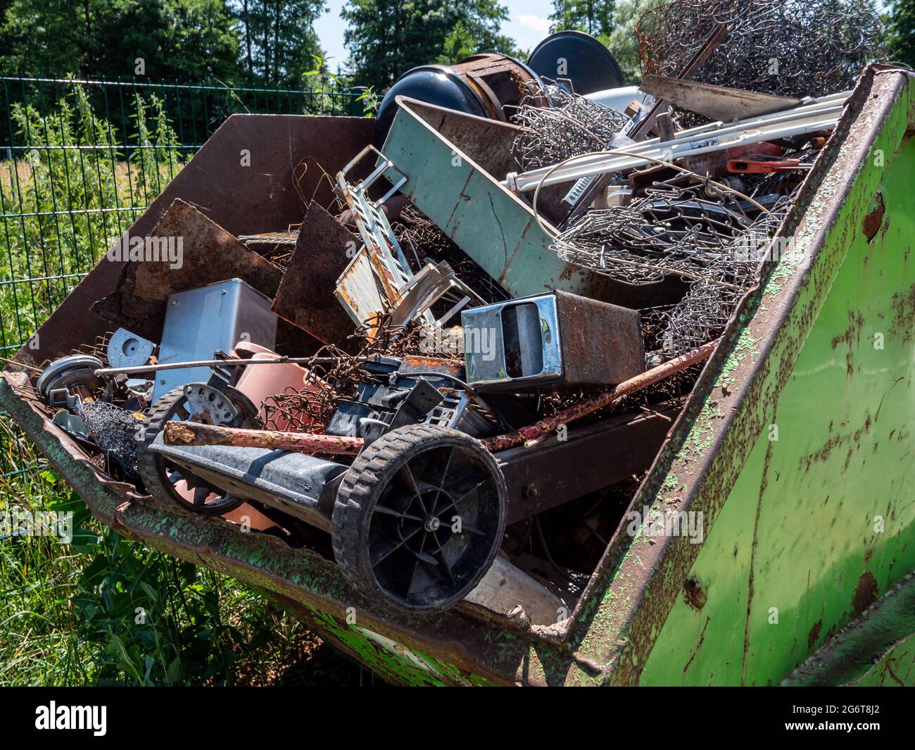 Containers with old scrap metal Stock Photo - Alamy