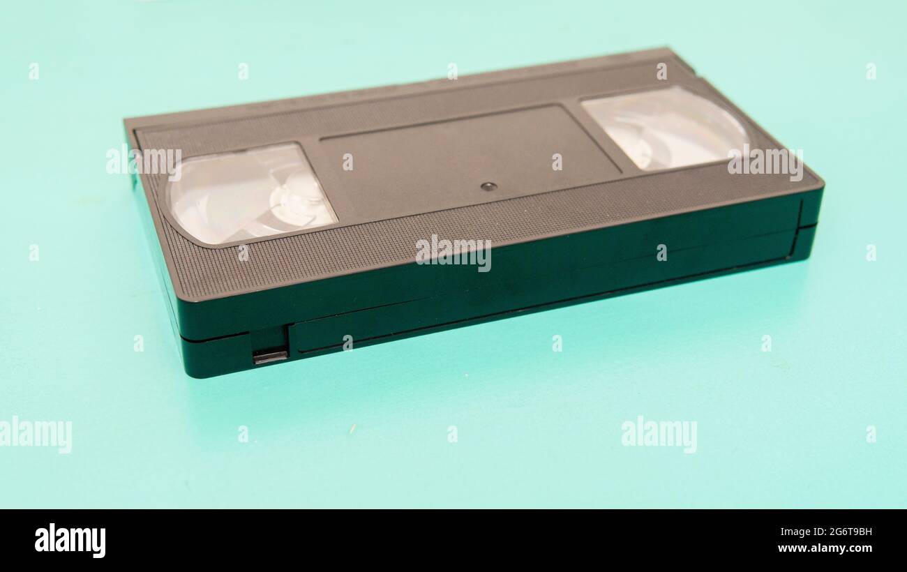 Close view of an old VHS tape over a cyan surface Stock Photo - Alamy