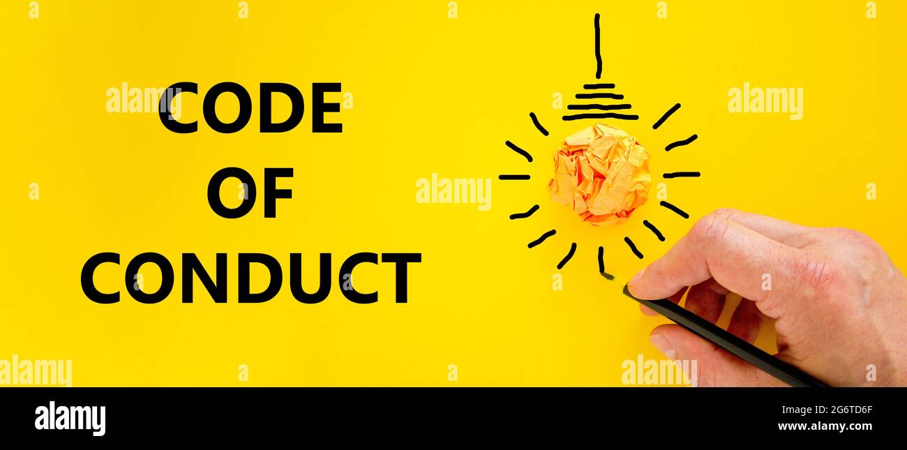 Code of conduct symbol. Businessman writing words 'Code of conduct ...