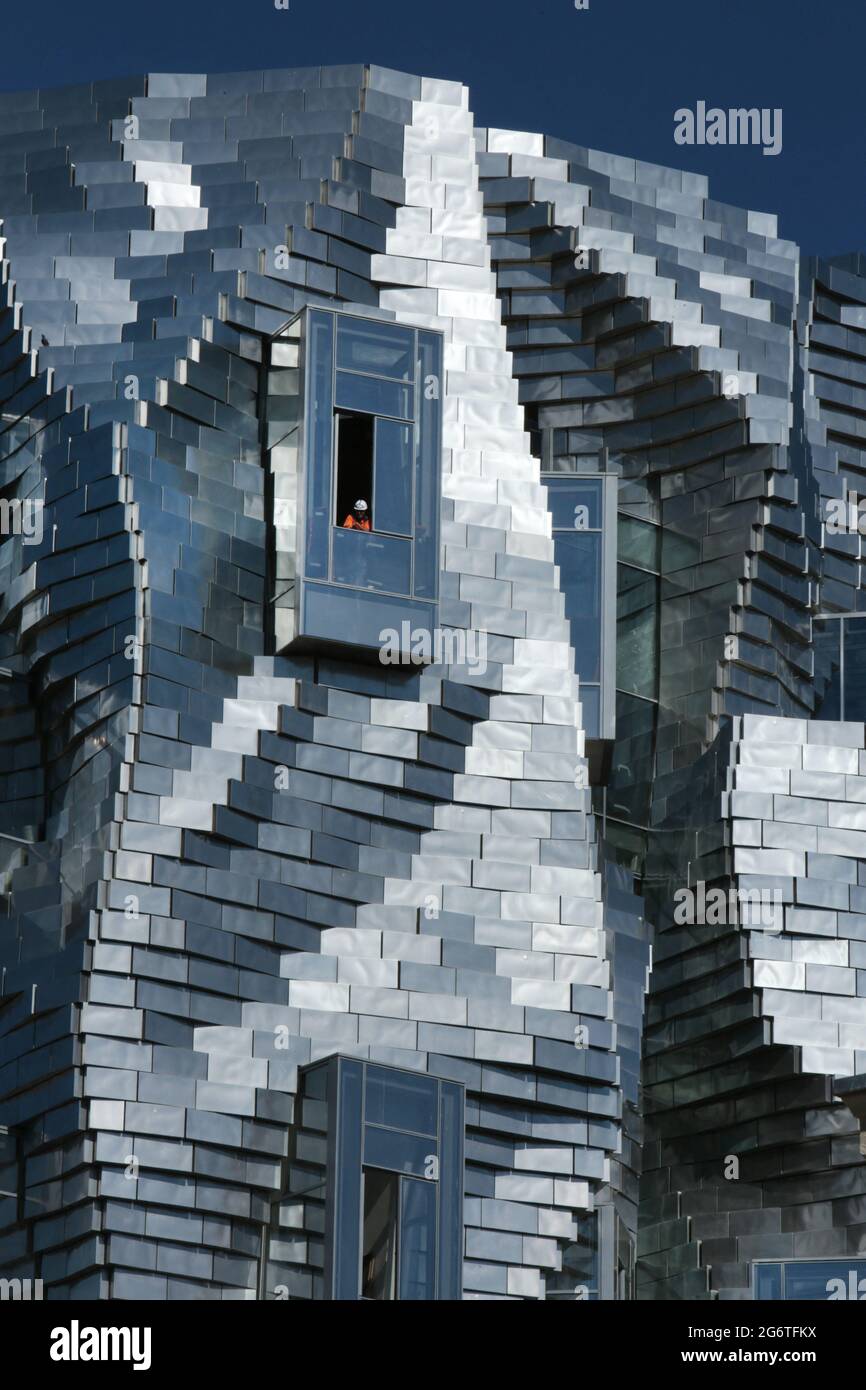 The twisting Luma tower clad in reflective aluminium tiles, designed by ...
