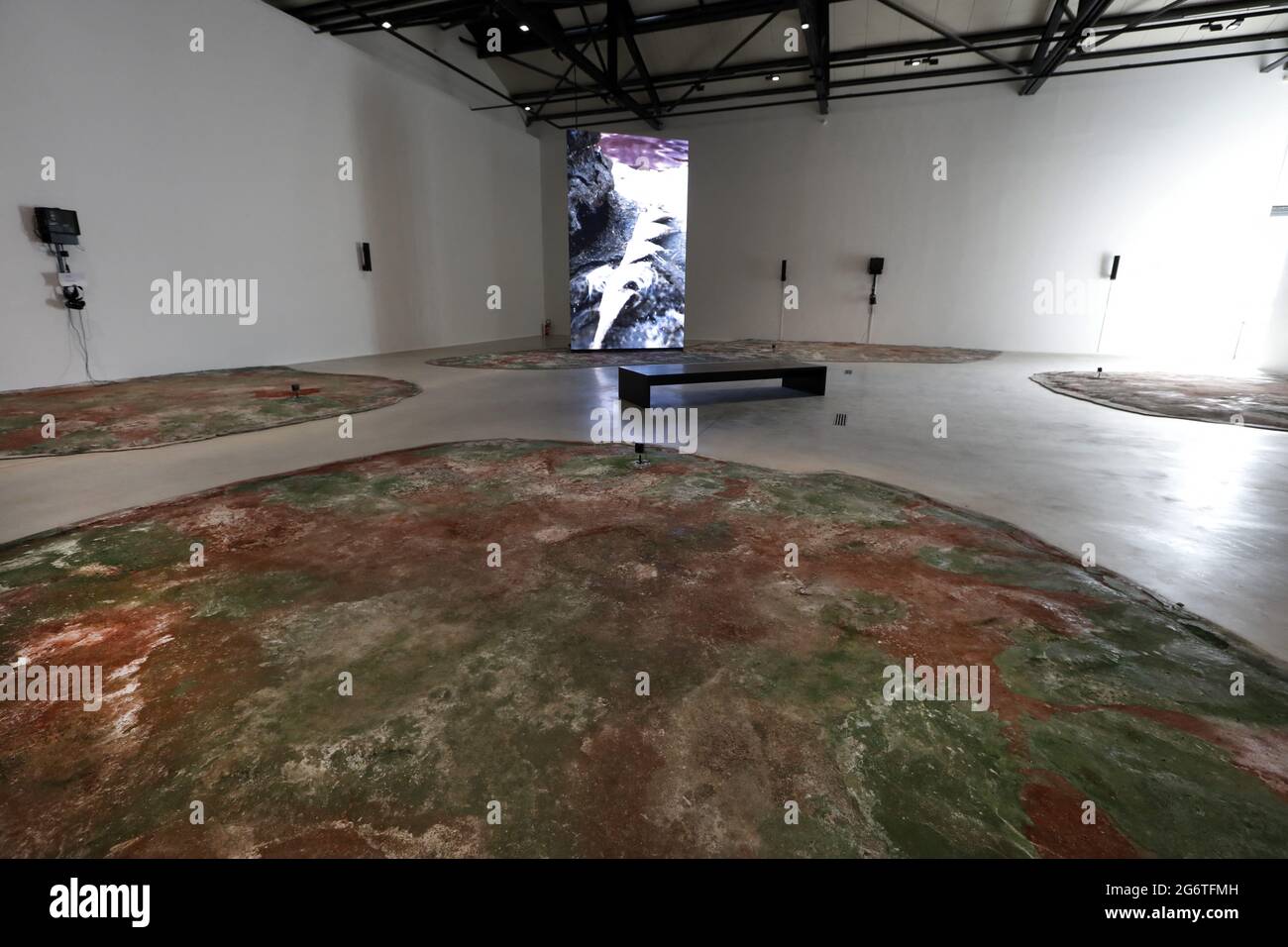 The twisting Luma tower clad in reflective aluminium tiles, designed by ...