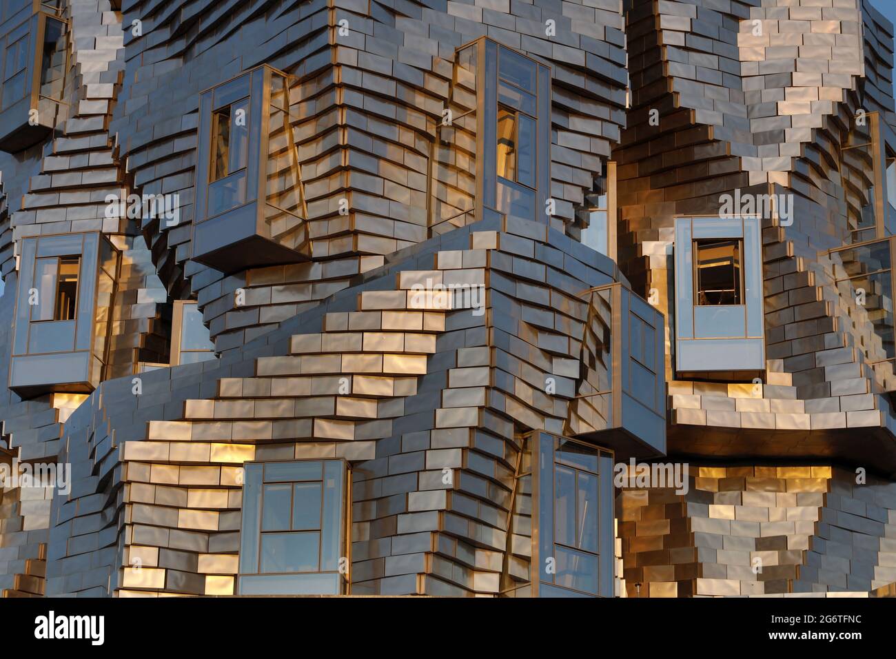 The twisting Luma tower clad in reflective aluminium tiles, designed by ...