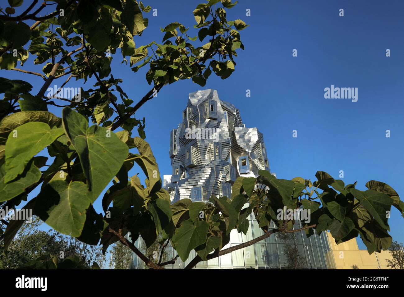 The twisting Luma tower clad in reflective aluminium tiles, designed by ...