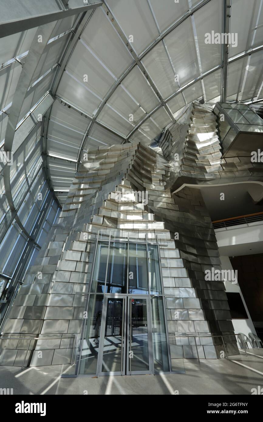 The twisting Luma tower clad in reflective aluminium tiles, designed by ...