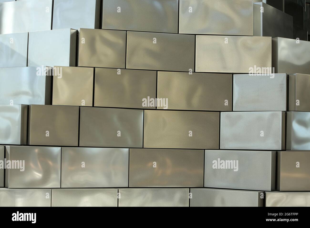 The twisting Luma tower clad in reflective aluminium tiles, designed by ...