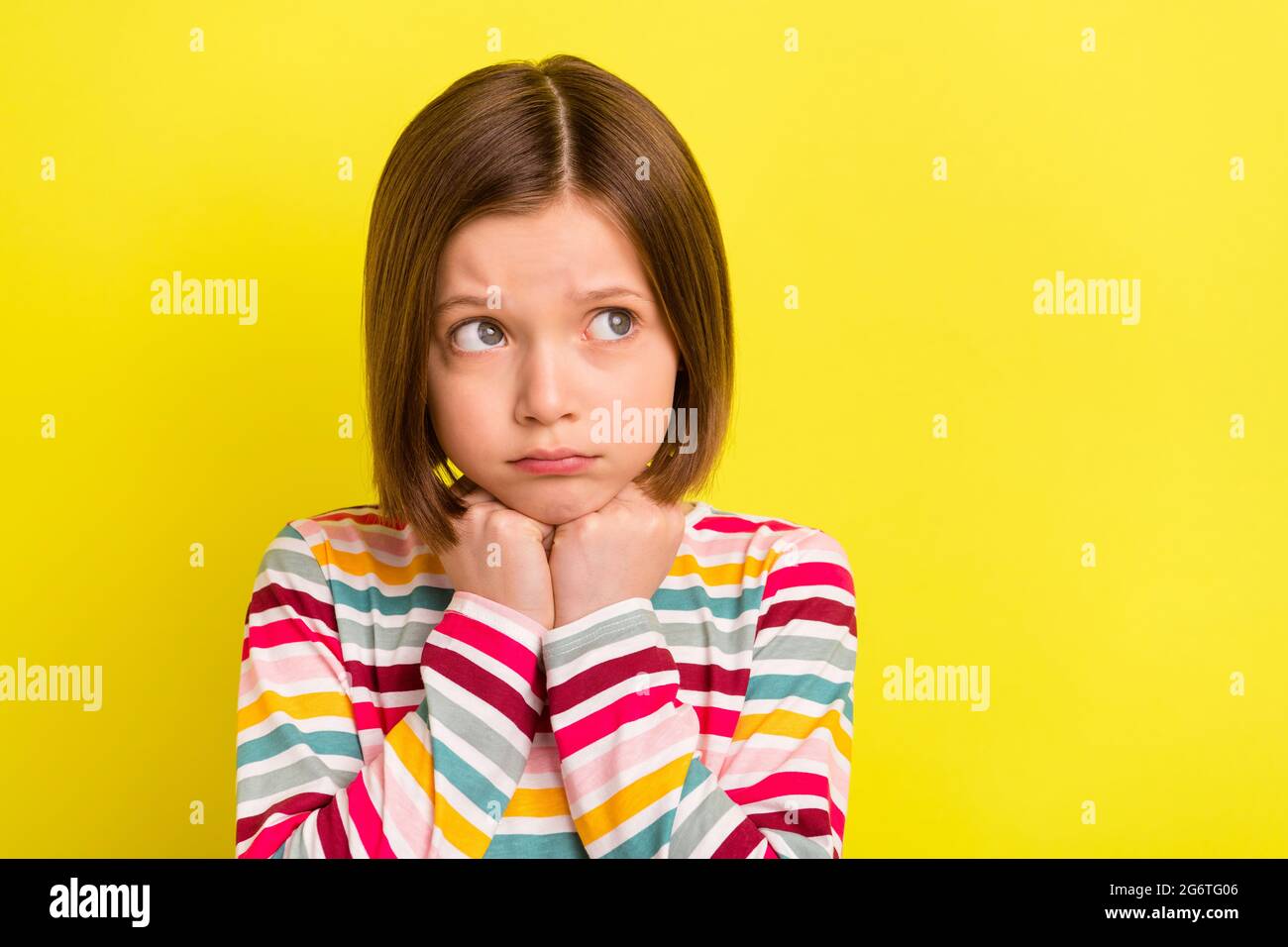 Photo of unhappy sad young little girl look empty space bad mood ...