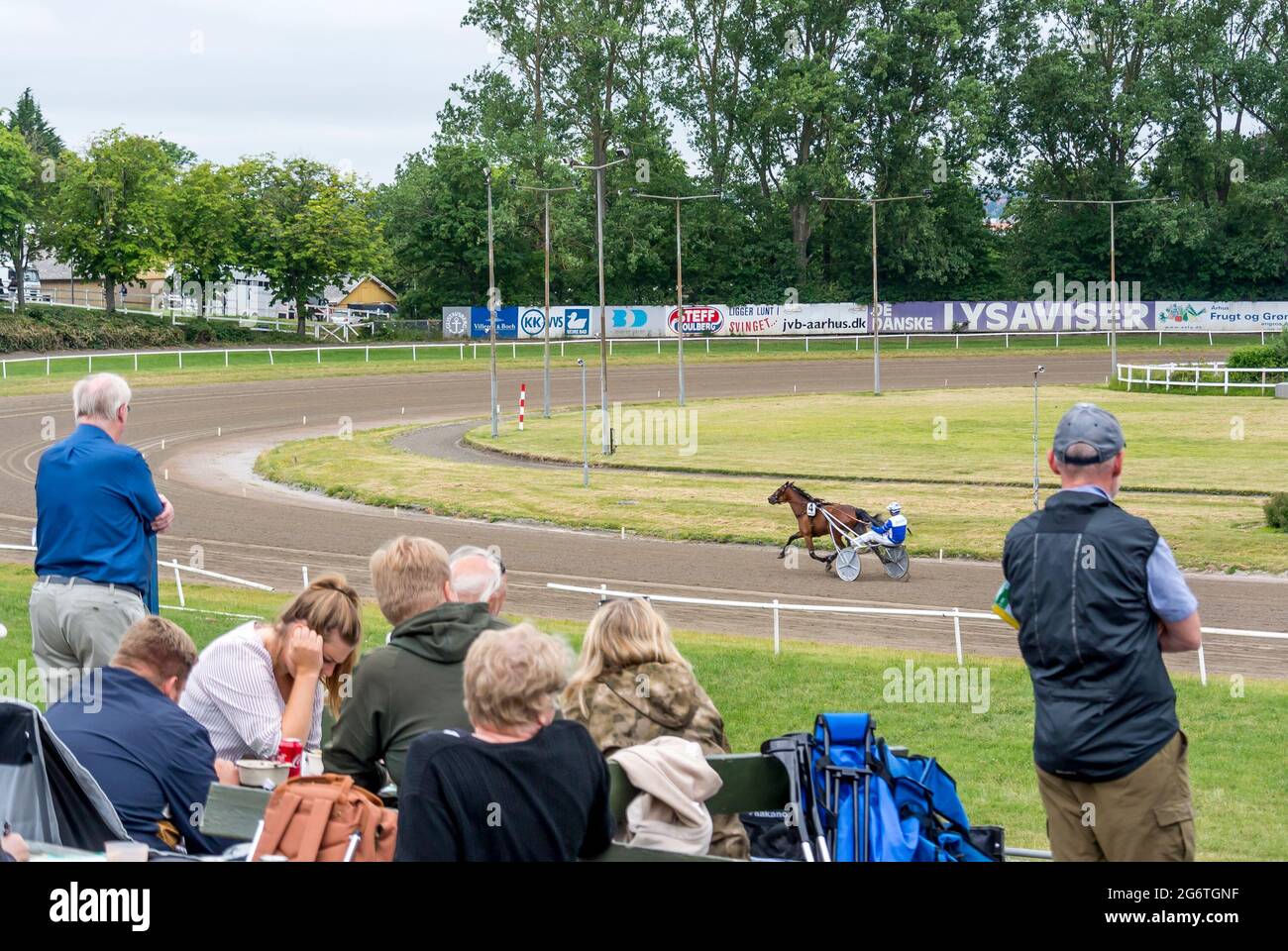 Aarhus, Denmark - 27 June 2021: People watch trotting derby, Sunshine ...