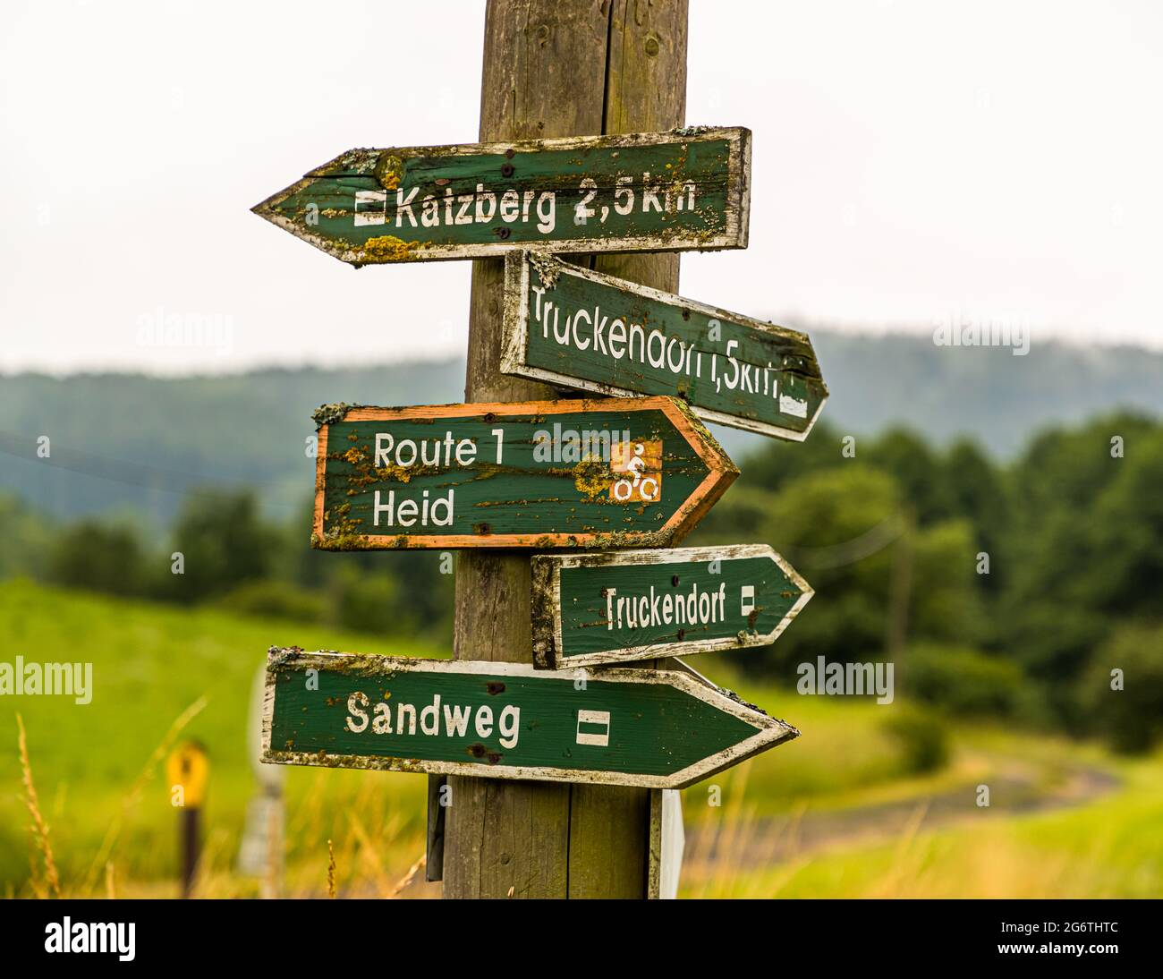 Various hiking trail signs in Görsdorf. The East German village of ...