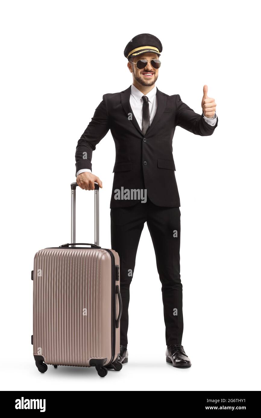 Full length portrait of a chauffeur with a suitcase gesturing a thumb ...