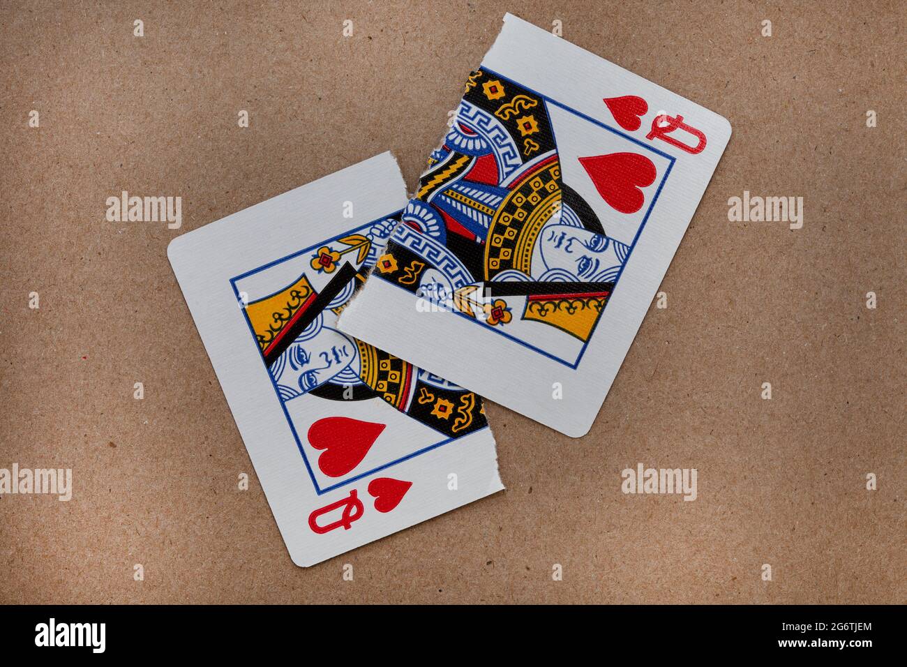 broken queen of hearts playing card Stock Photo - Alamy