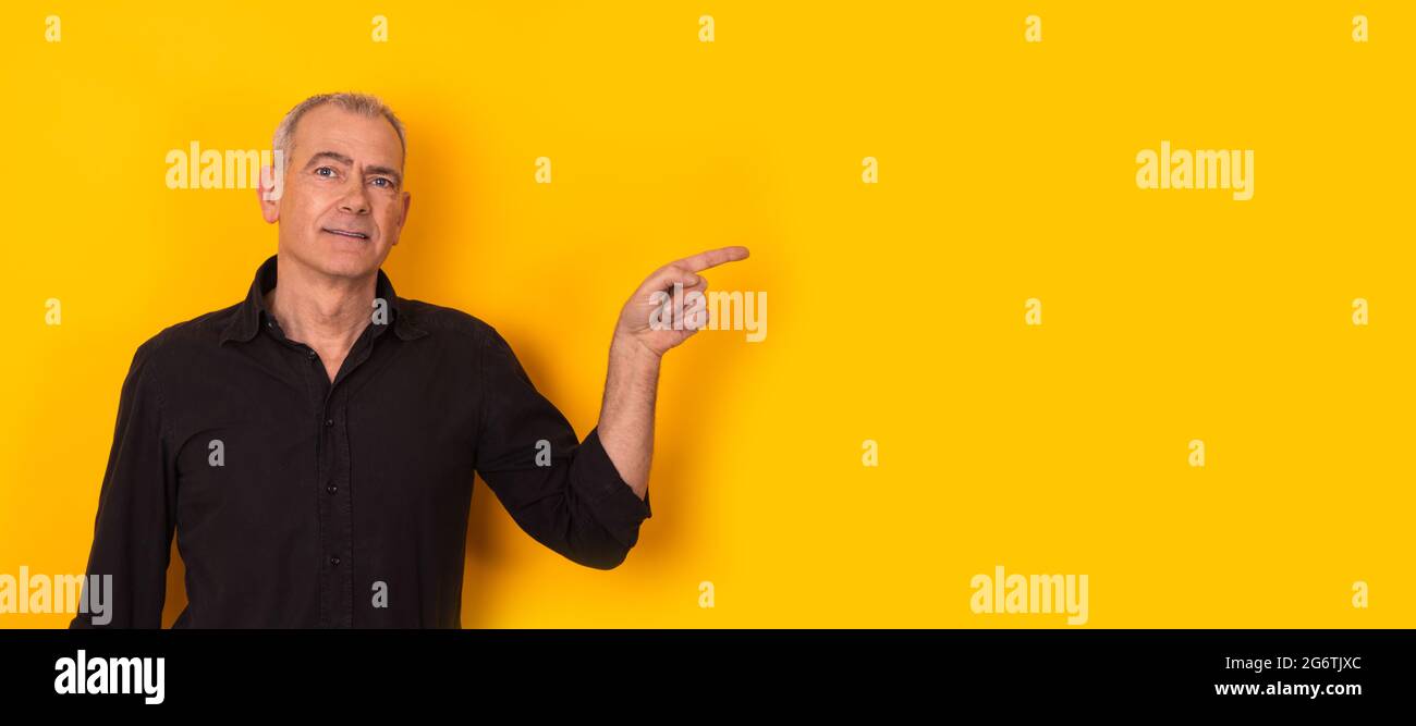 isolated adult man pointing with space Stock Photo - Alamy