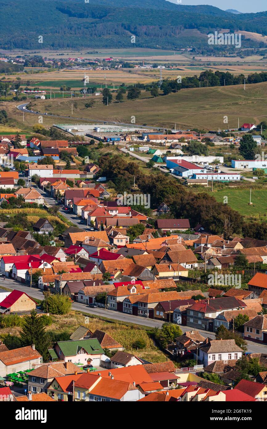 Aerial view of the town center with hills, buildings, streets ...