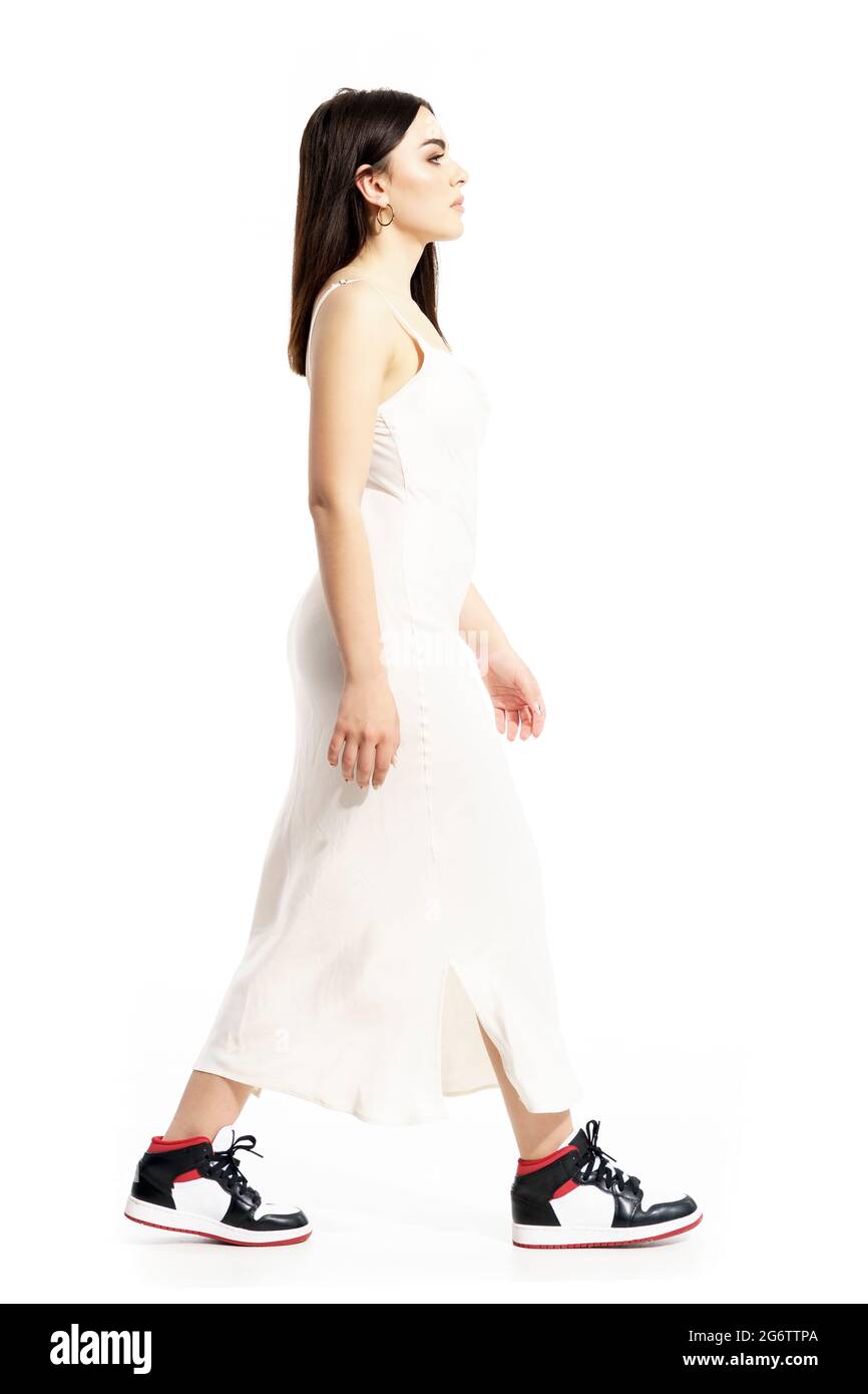 Stylish woman walking side view hi-res stock photography and images - Alamy