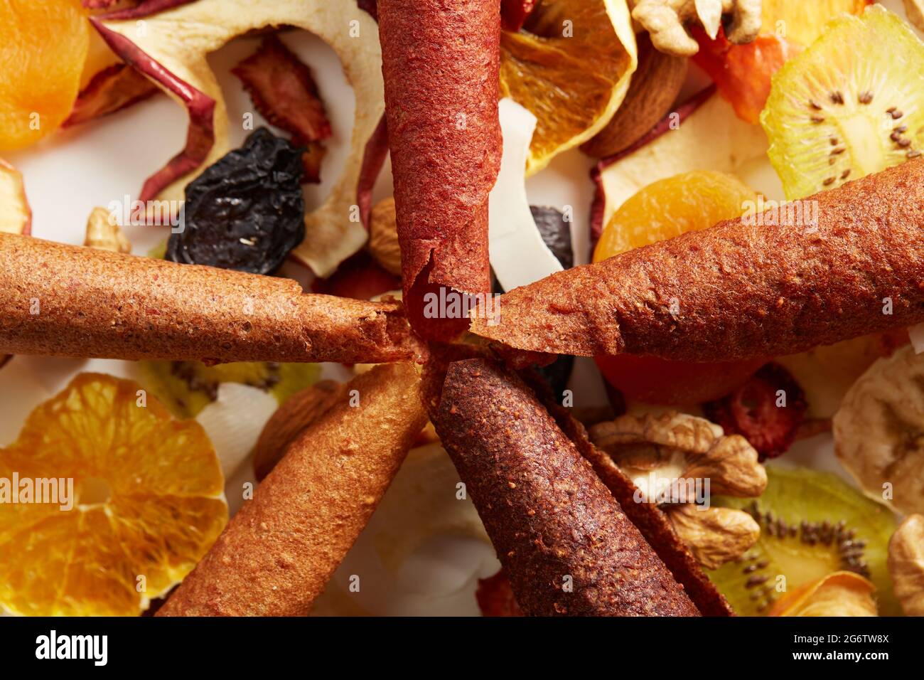 Close up of delicious juicy fruit lozenge of own production on table ...