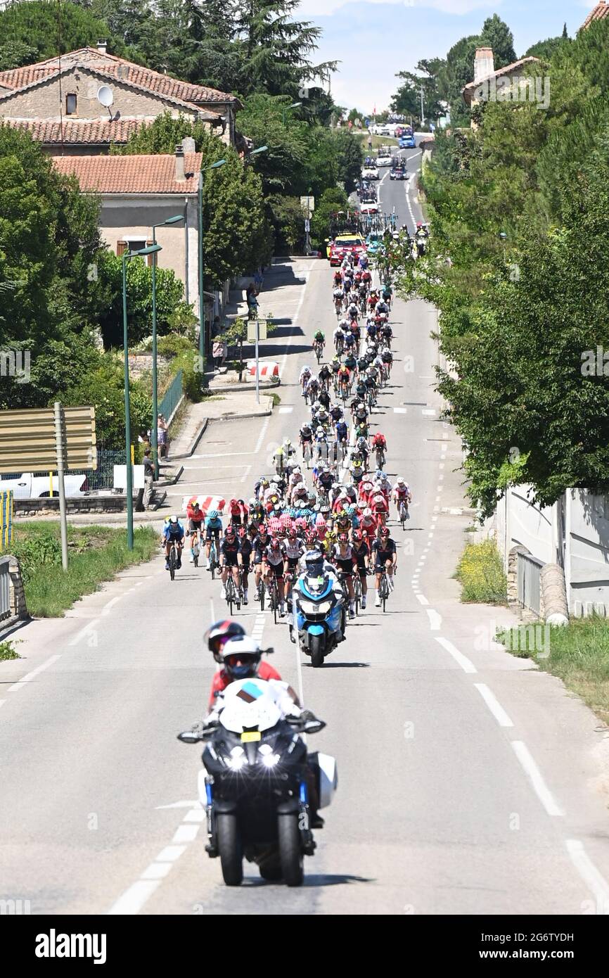 The peloton ride through the French countryside during stage 12 of the ...