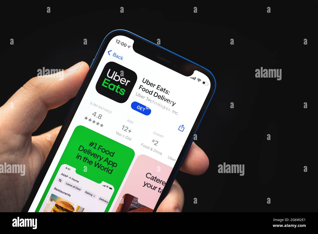 Kharkov, Ukraine - June 4, 2021: Uber Eats app, man use food delivery ...